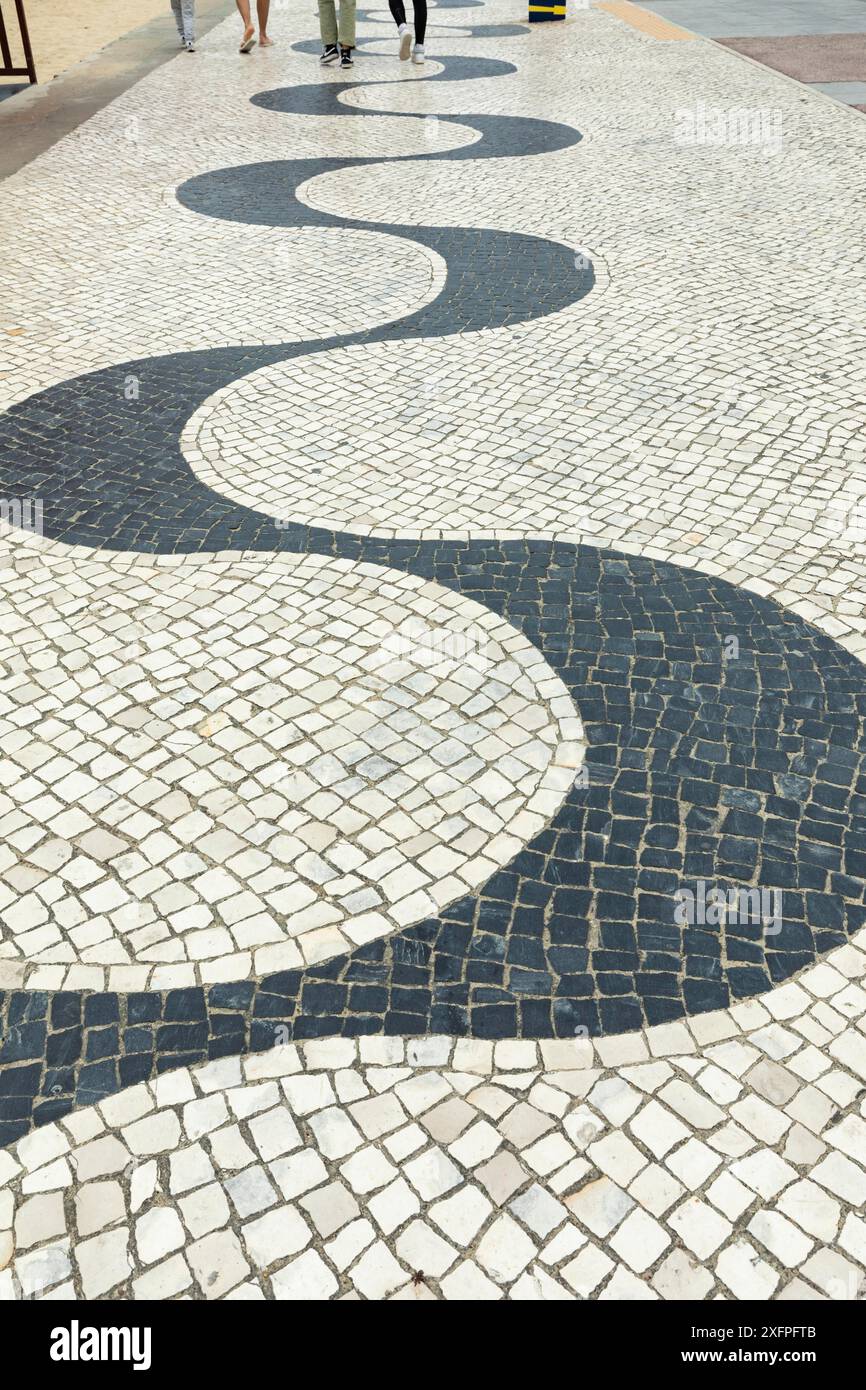 Traditional wave shaped pavement in Portugal Stock Photo - Alamy