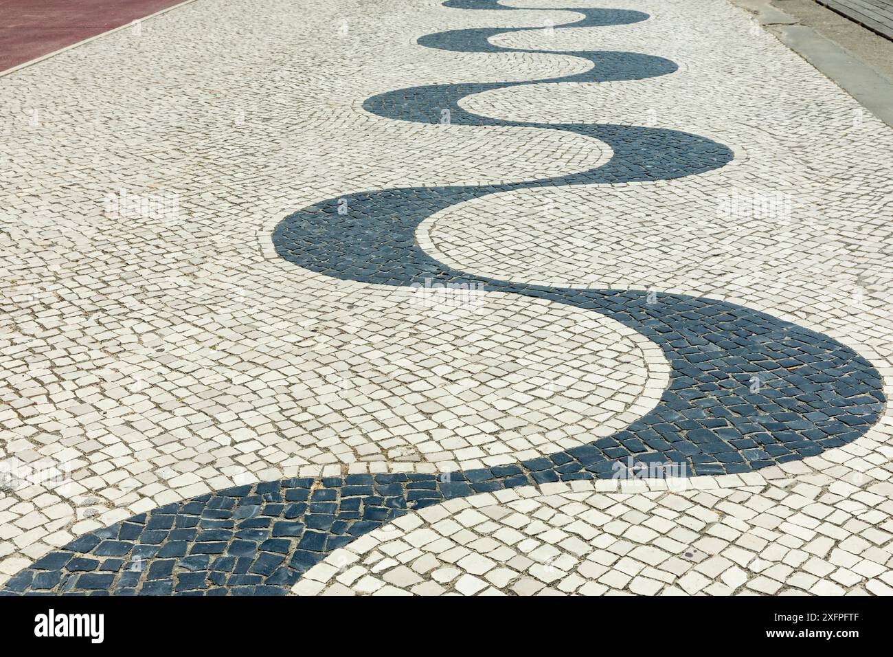 Traditional wave shaped pavement in Portugal Stock Photo - Alamy