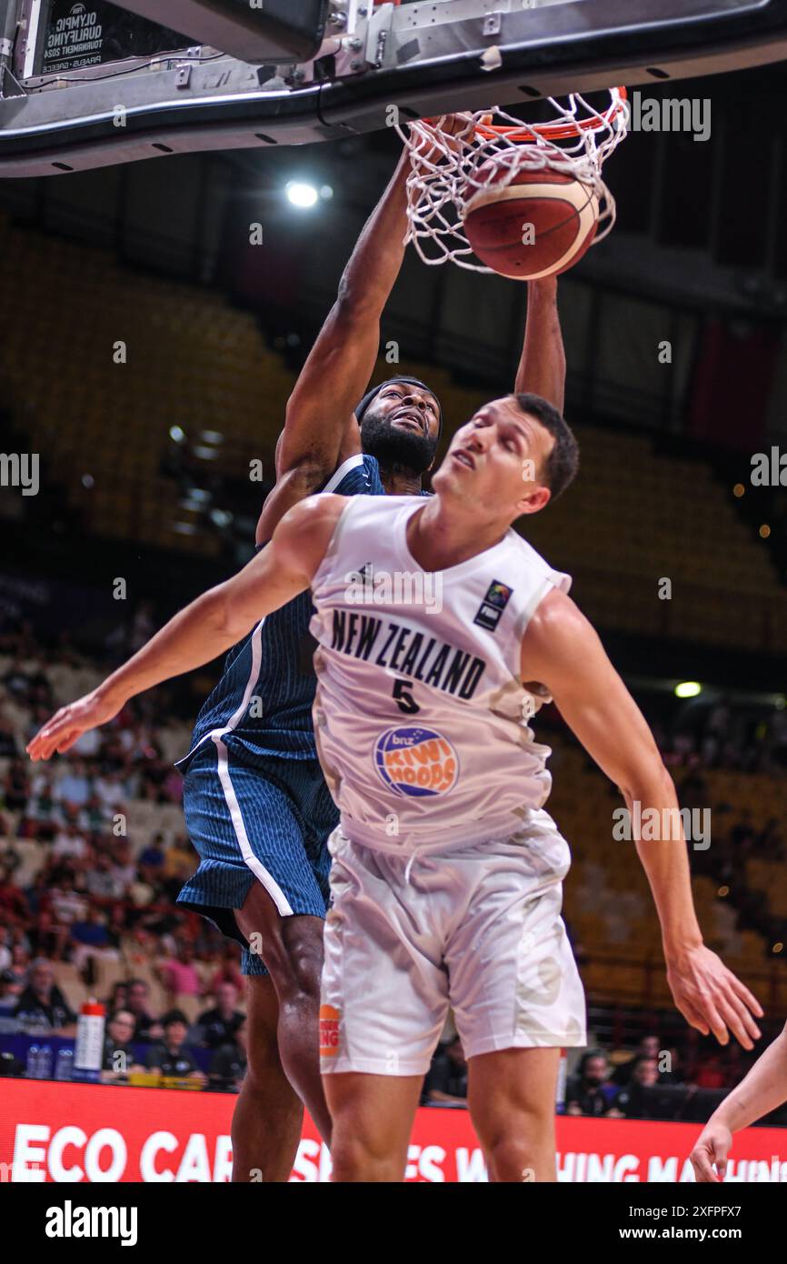 Josh Nebo (Slovenia) dunking on Yannick Wetzell (New Zealand). FIBA ...