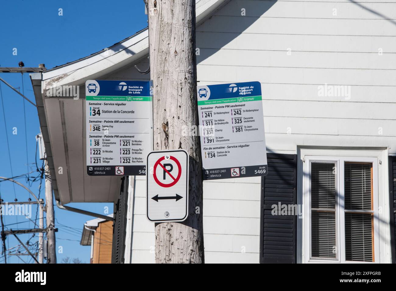 Bus stop signs on chem. du Fleuve in Levis, Quebec, Canada Stock Photo ...