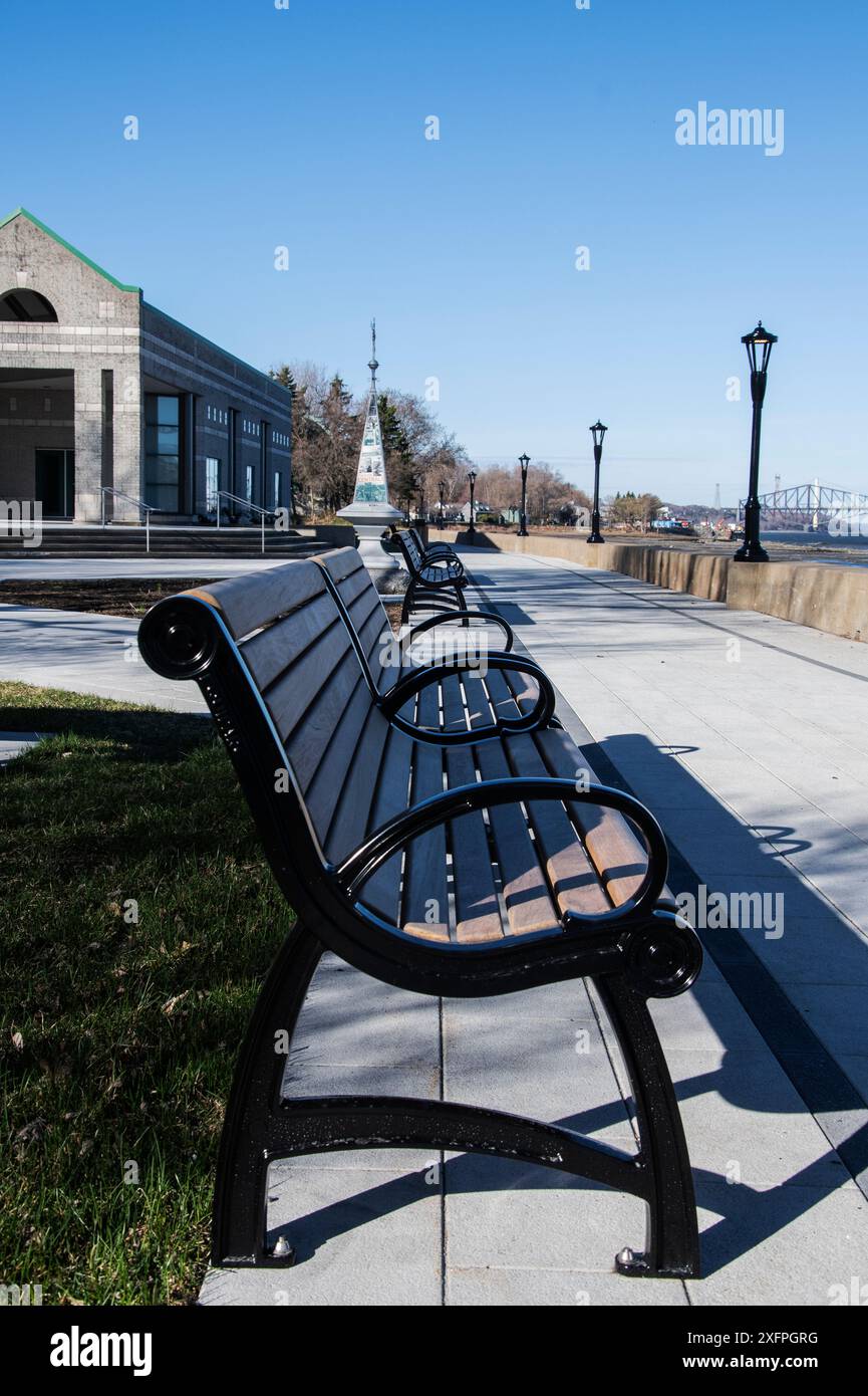 Benches on the river front on chem. du Fleuve in Levis, Quebec, Canada ...