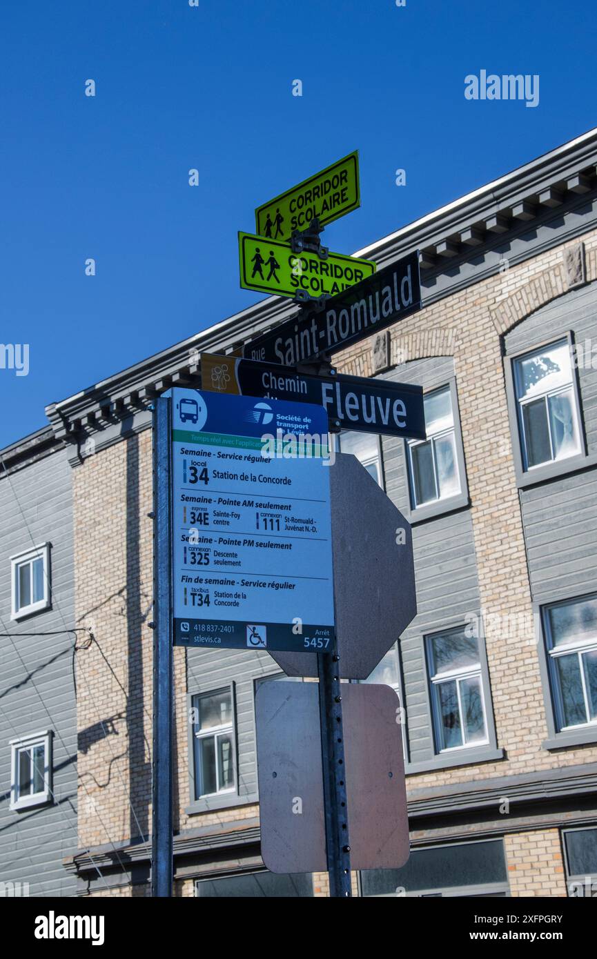 Bus stop signs on chem. du Fleuve in Levis, Quebec, Canada Stock Photo ...