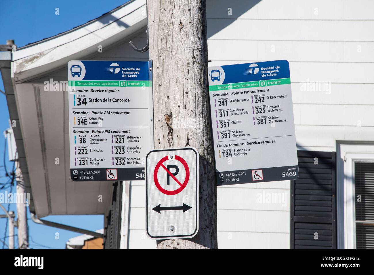 Bus stop signs on chem. du Fleuve in Levis, Quebec, Canada Stock Photo ...