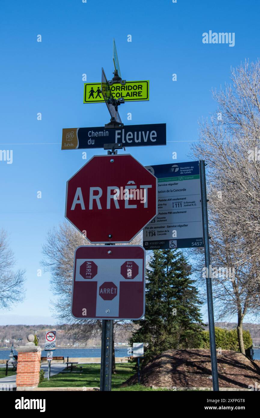 Chem. du Fleuve, stop and bus stop signs in Levis, Quebec, Canada Stock ...
