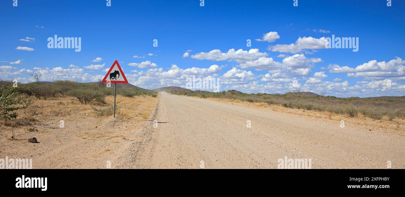 Sign Elephants crossing a gravel track near Palmwag in Namibia Stock ...
