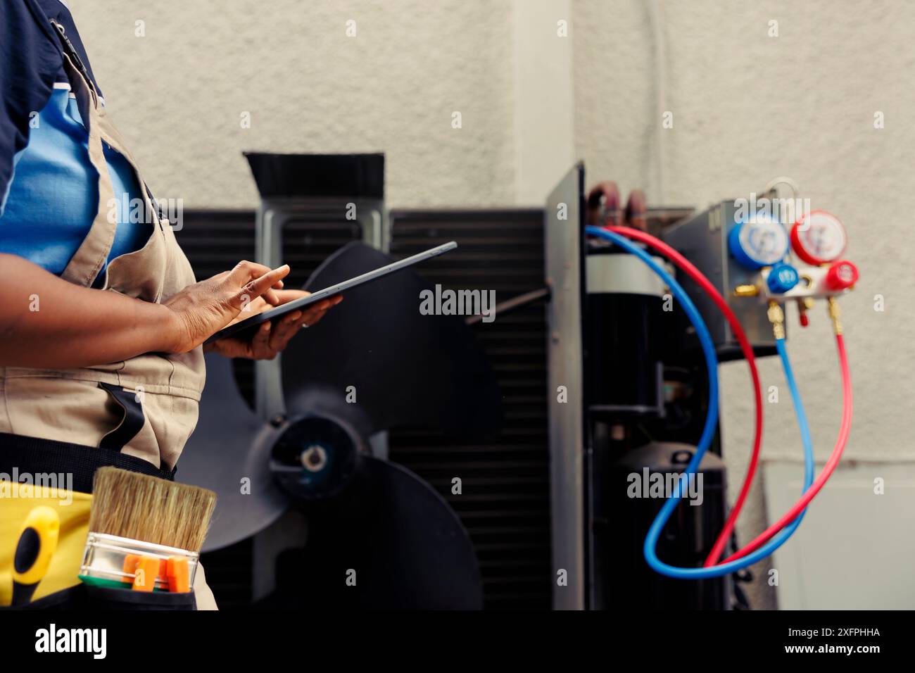 Expert repairman doing inspection refrigerant hi-res stock photography ...