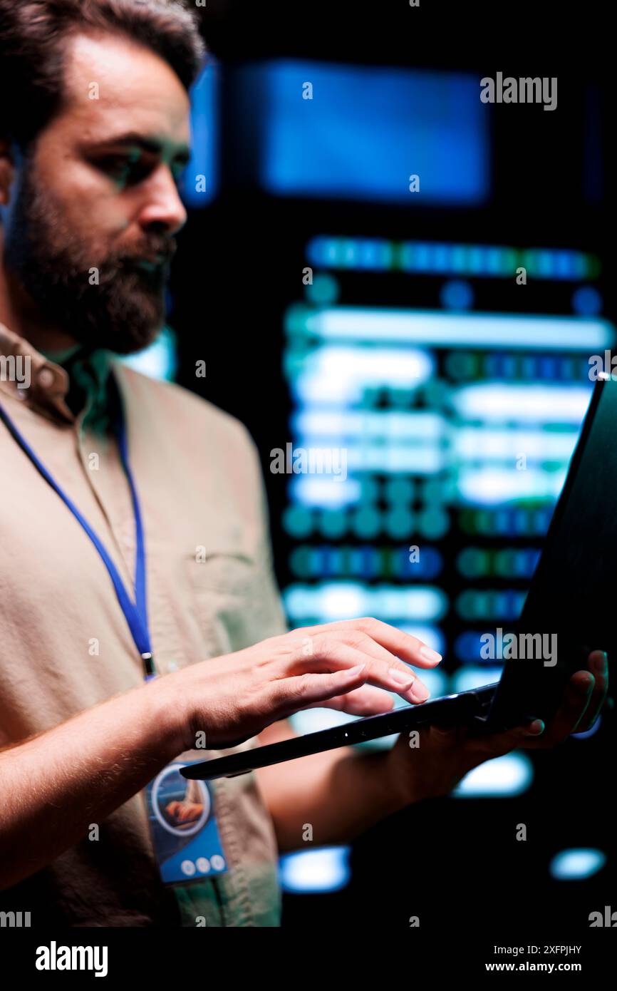 Technician doing system analysis typing hi-res stock photography and images - Alamy