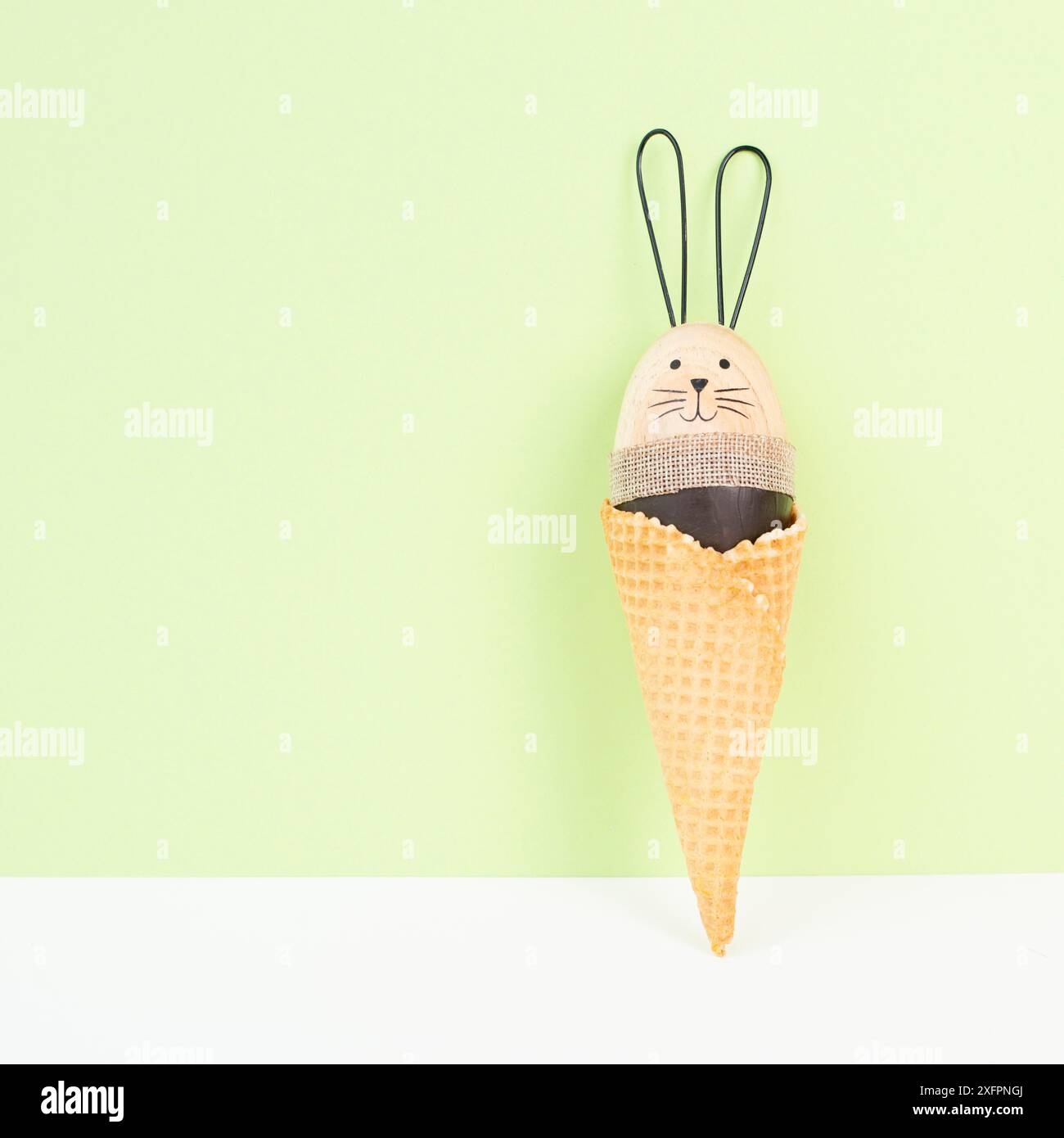 Cute easter bunny or rabbit in an ice cream cone, spring holiday ...