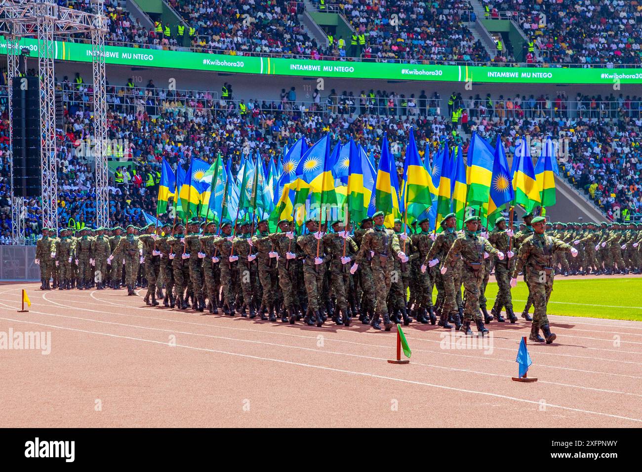 Kigali, Rwanda. 4th July, 2024. Soldiers march during a military parade ...