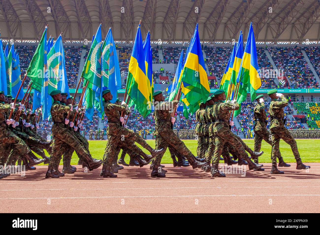 Kigali, Rwanda. 4th July, 2024. Soldiers march during a military parade ...