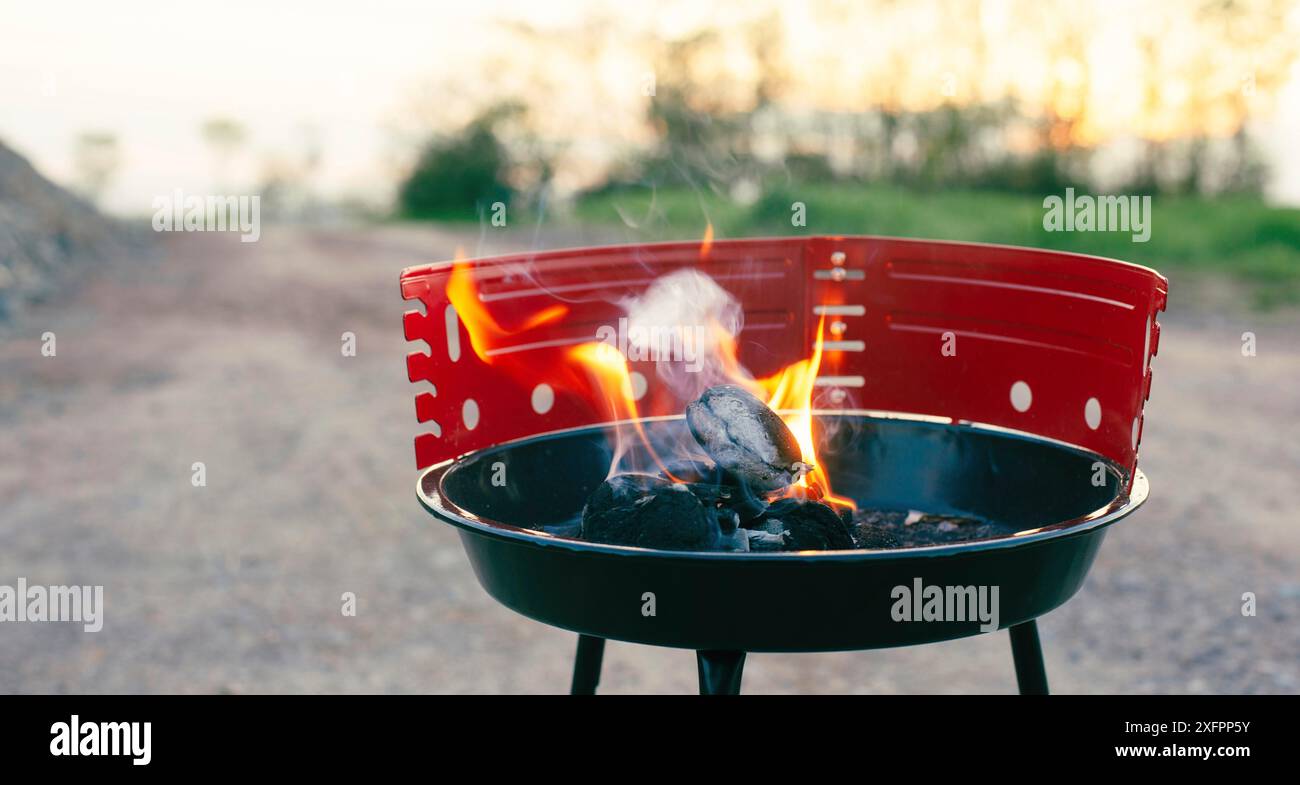 Barbecue grill fire on nature hi-res stock photography and images - Alamy