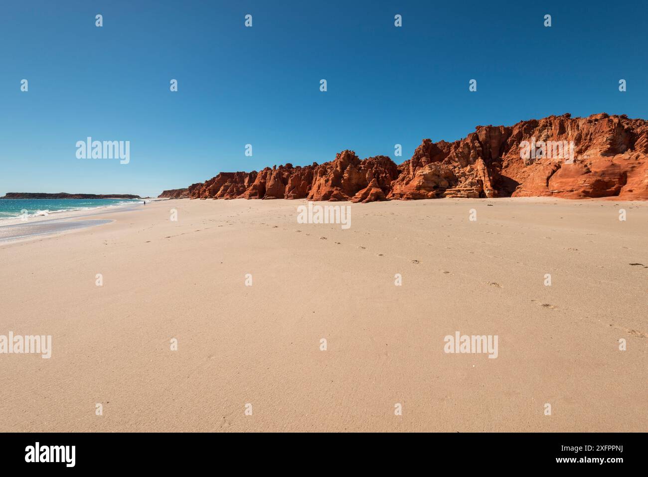 White sand beach with sandstone cliffs, Dampier Peninsula, Kimberley ...