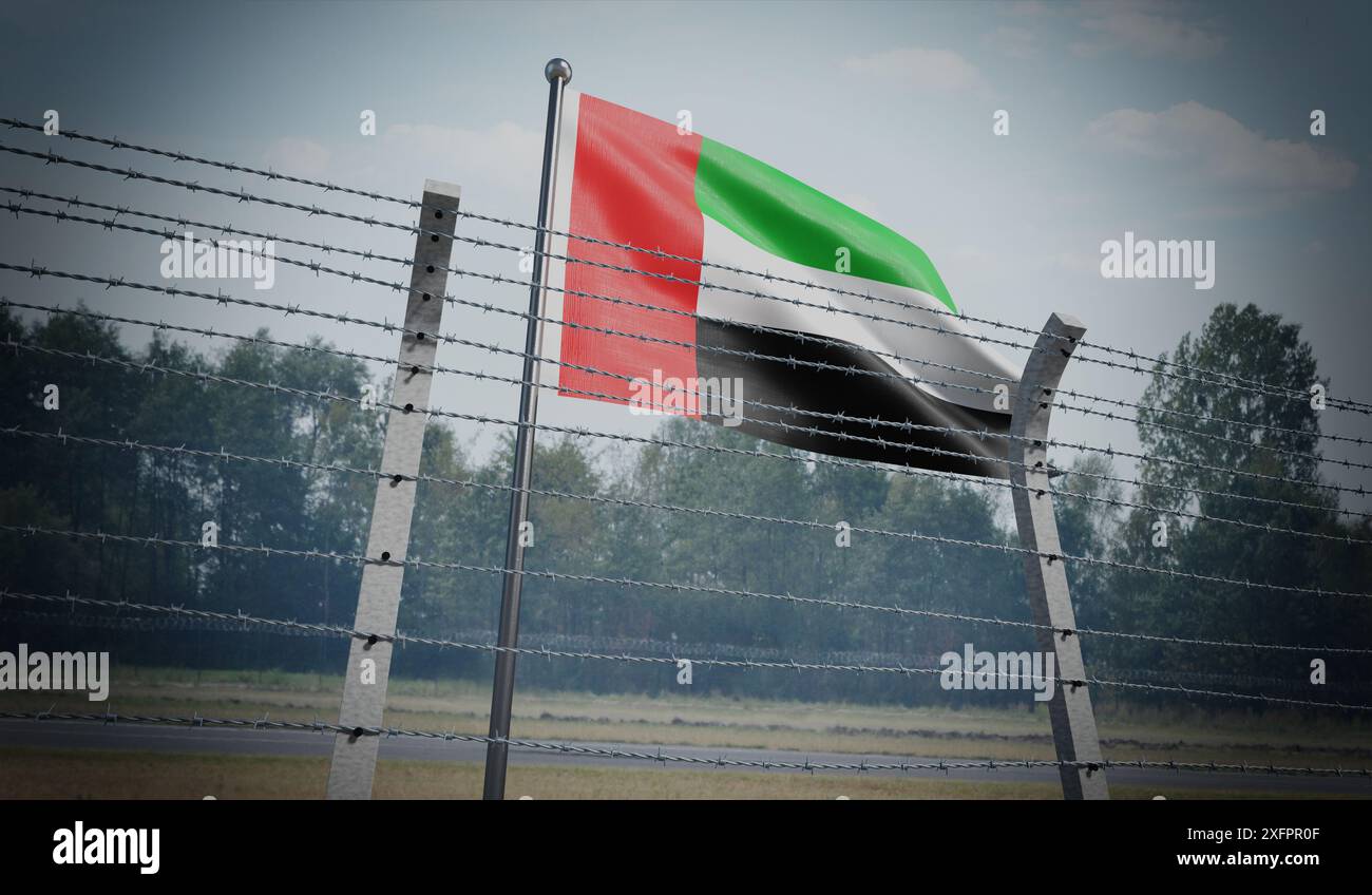 Barbed wire fence and flag of United Arab Emirates - border concept ...