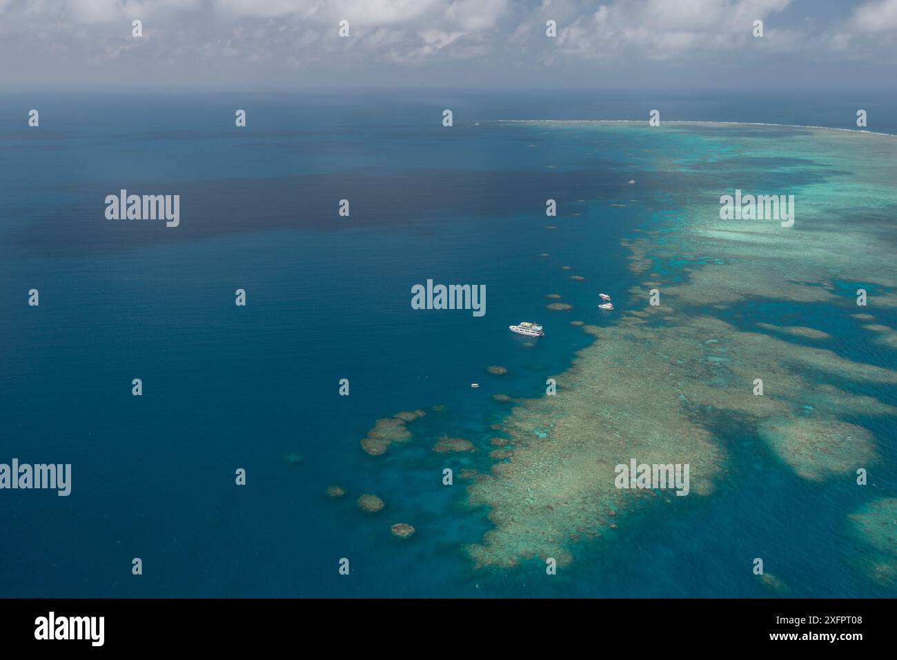 Aerial view of the reefs of the Great Barrier Reef showing the tourist ...