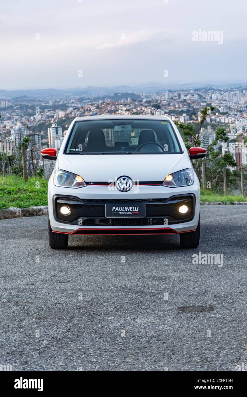 White Volkswagen front view, city landscape, high resolution portrait ...