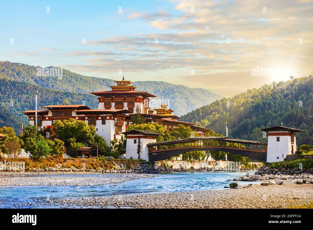 The famous Punakha Dzong with the wooden bridge Stock Photo - Alamy