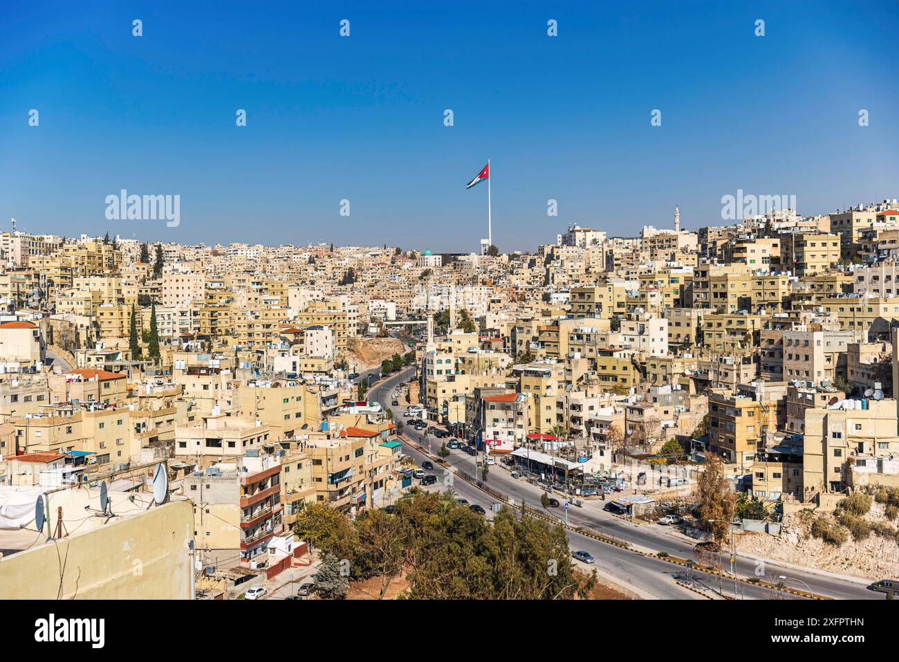 Jordan flag in Amman, panorama view of cloudy sky Stock Photo - Alamy