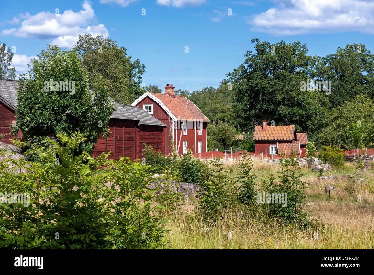 Orf in Smaland, Sweden, with typical red wooden houses in ...