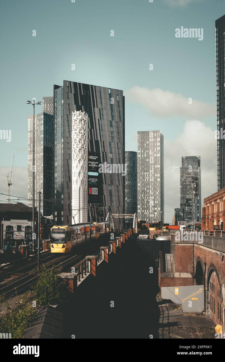 A Bee Network tram on the Metrolink Network in Manchester. In the ...
