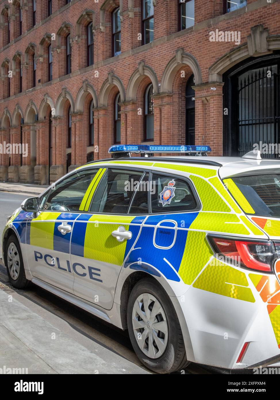 Greater Manchester Police car in the City Stock Photo - Alamy