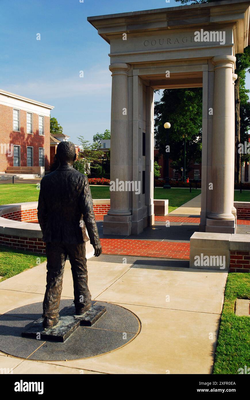 A statue of student James Meredith walks through an opening ...