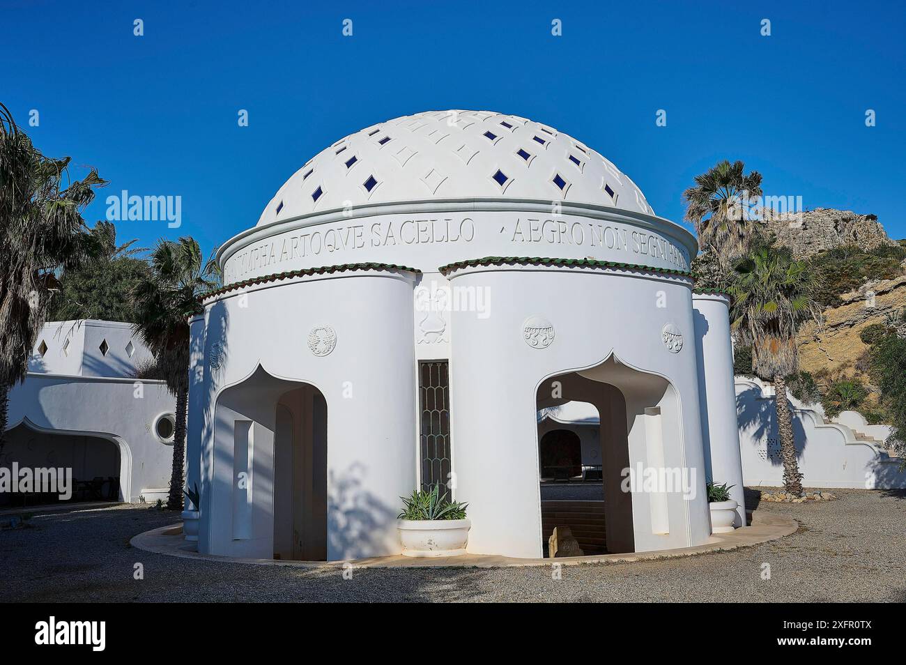 Round white building with domed roof and Mediterranean architecture ...