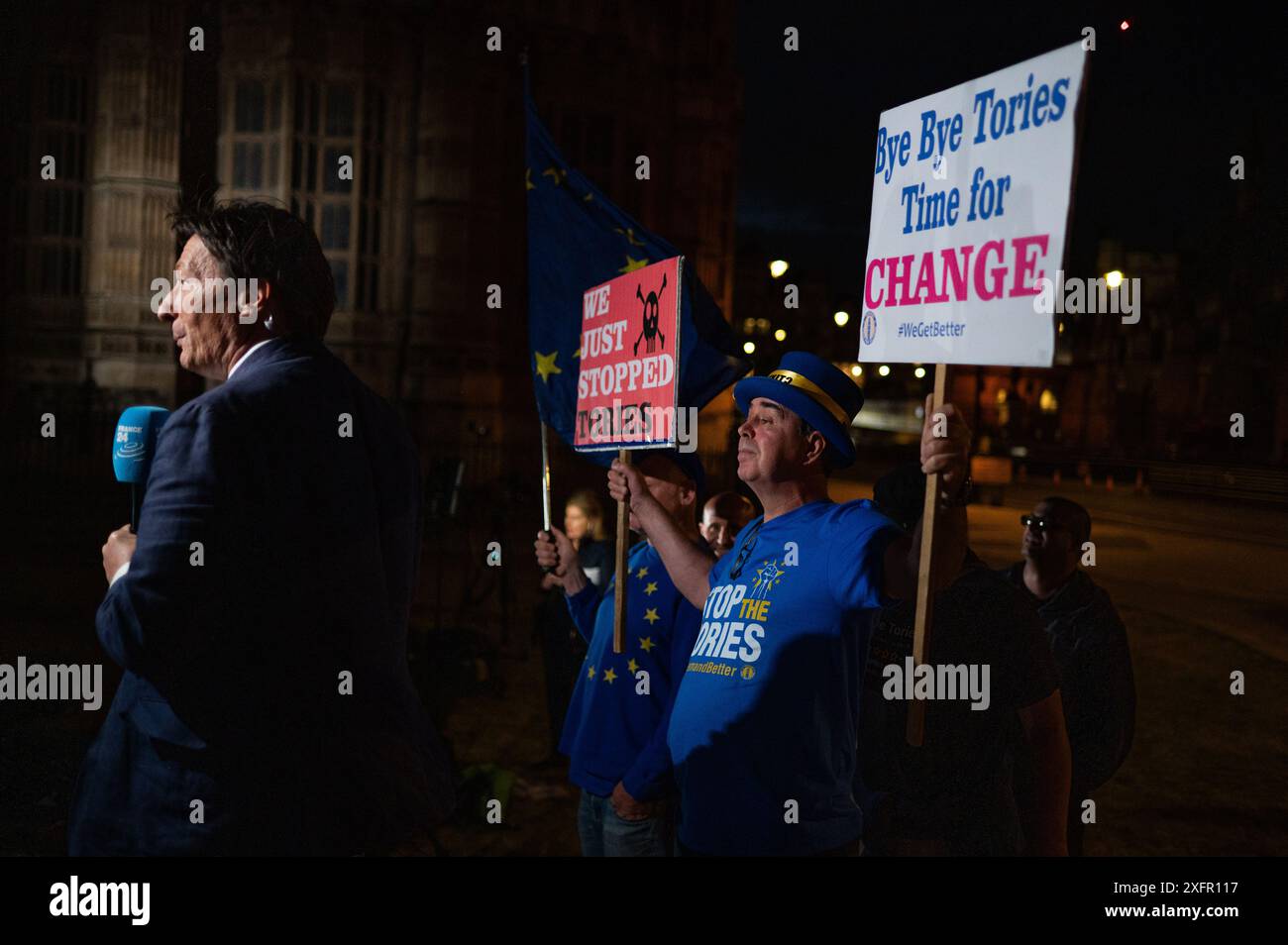 London, UK. 4th July, 2024. A member of the public holding a sign that ...