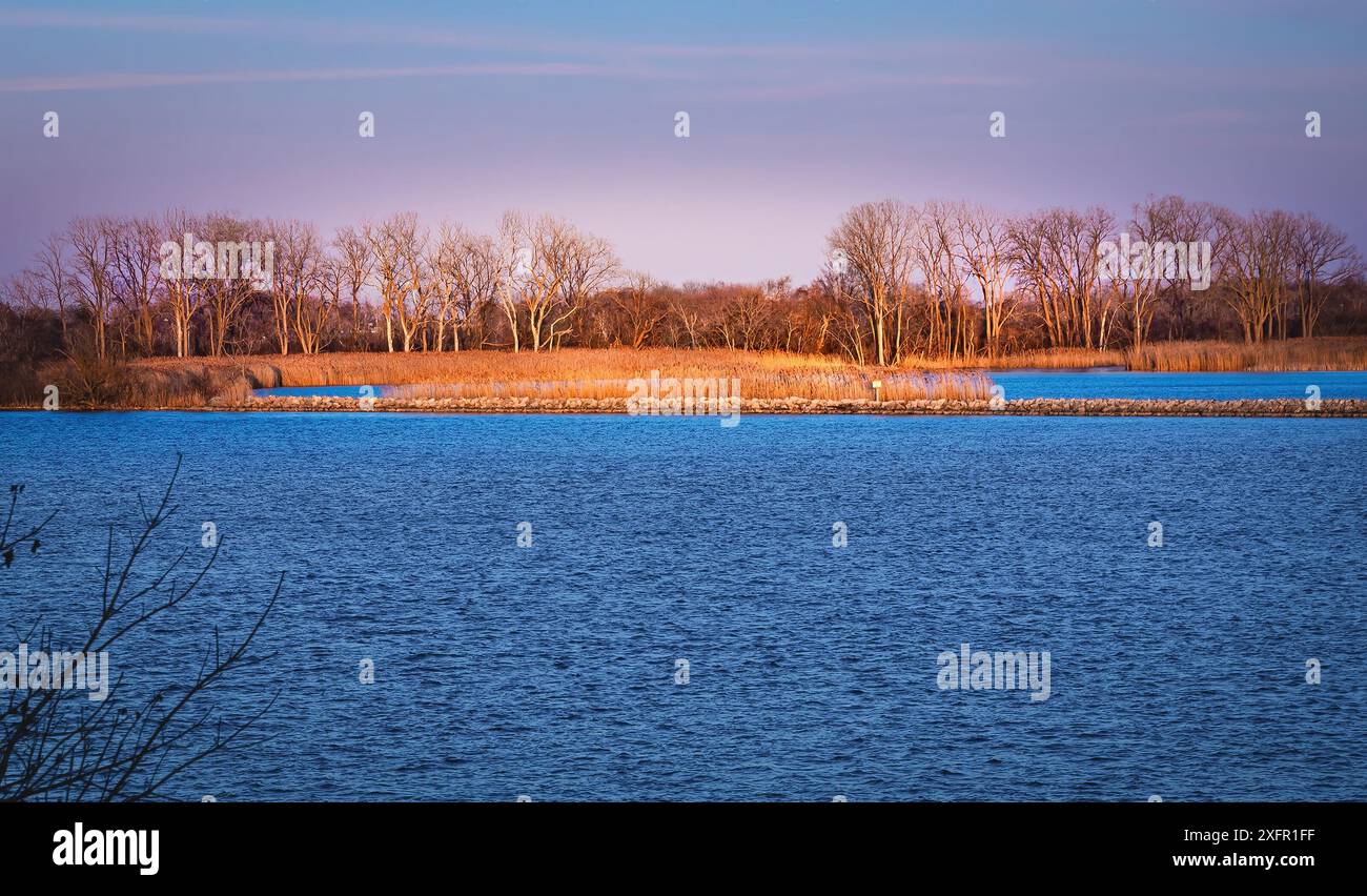 Island in Detroit River waterway Sunset Glow Stock Photo - Alamy