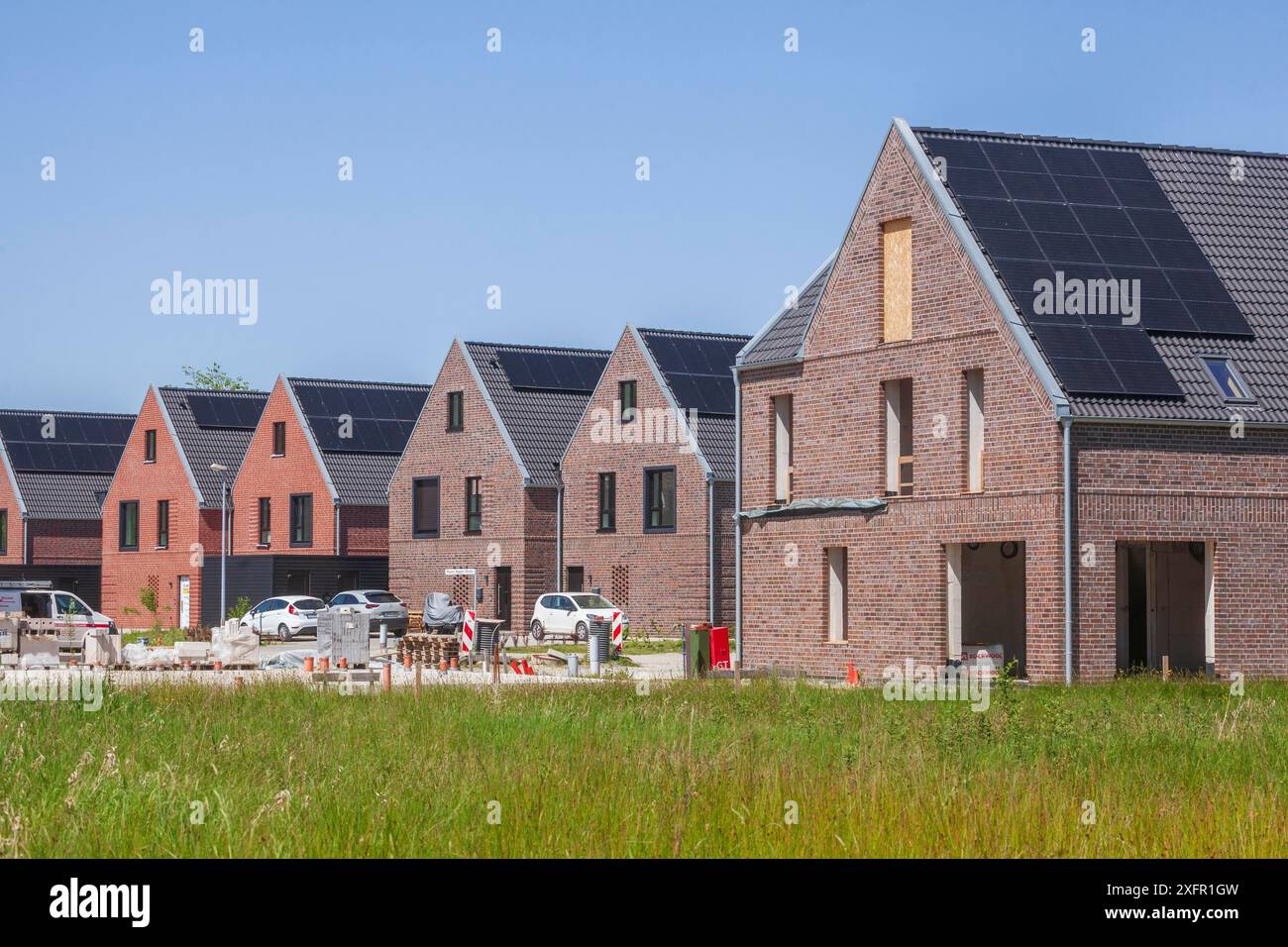 Residential buildings, new brick buildings and construction site with ...