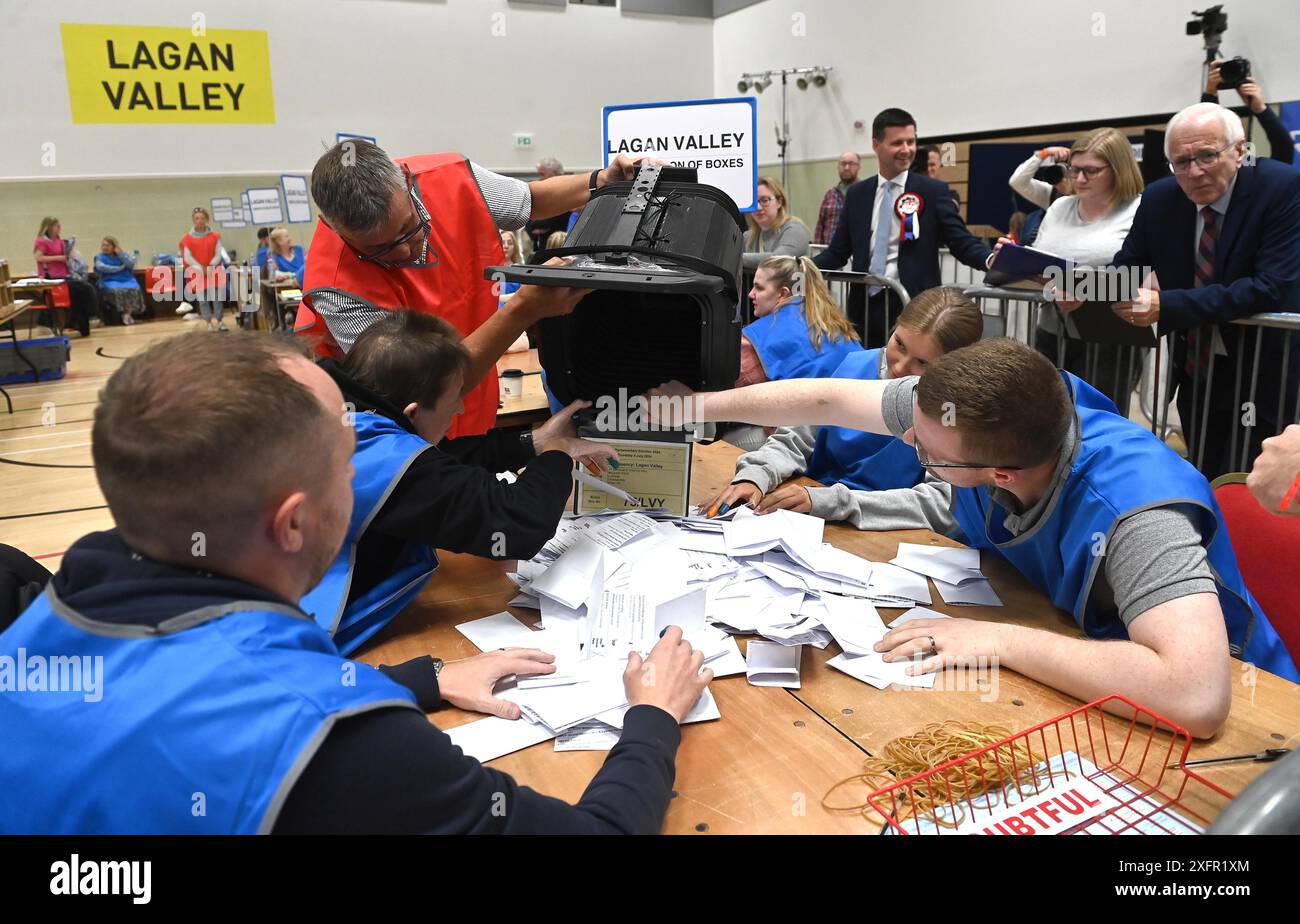 Voting slips are emptied from a ballot box at the Lagan Valley ...