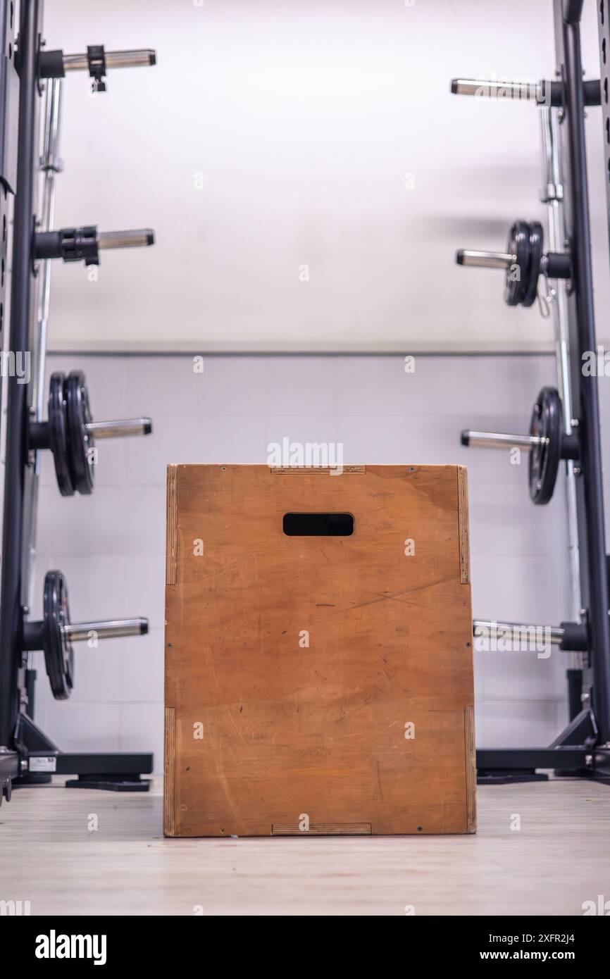 plyometric jump box and several weights are seen in a crossfit gym ...