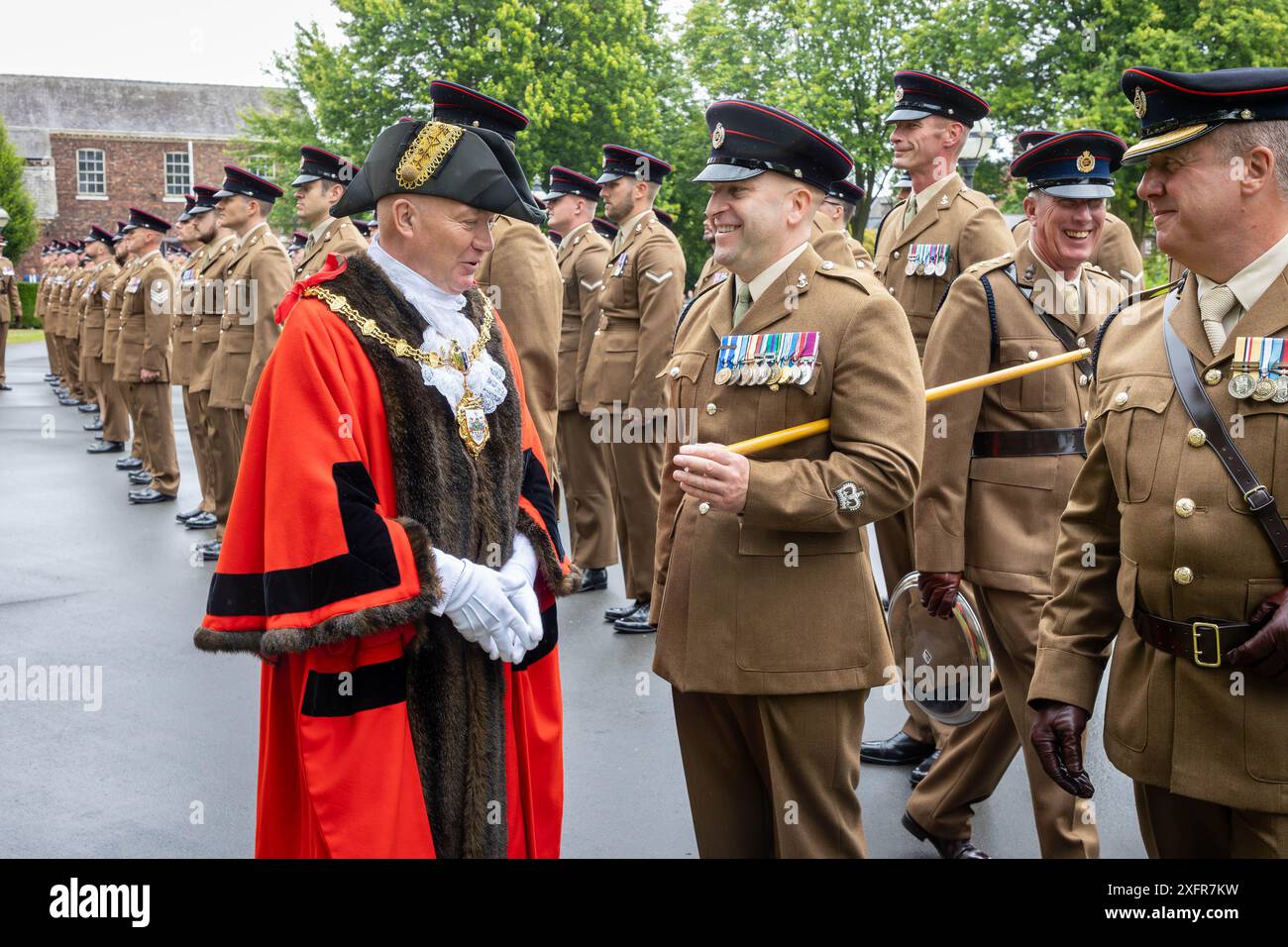 Mayor talks to officer with swagger stick of 75 Engineers Regiment as ...