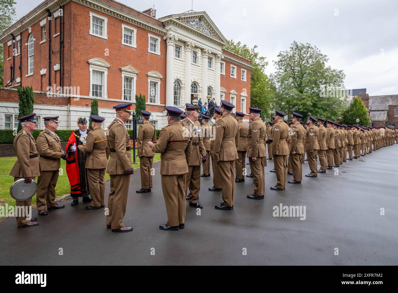 Mayor talks to officer with swagger stick of 75 Engineers Regiment as ...