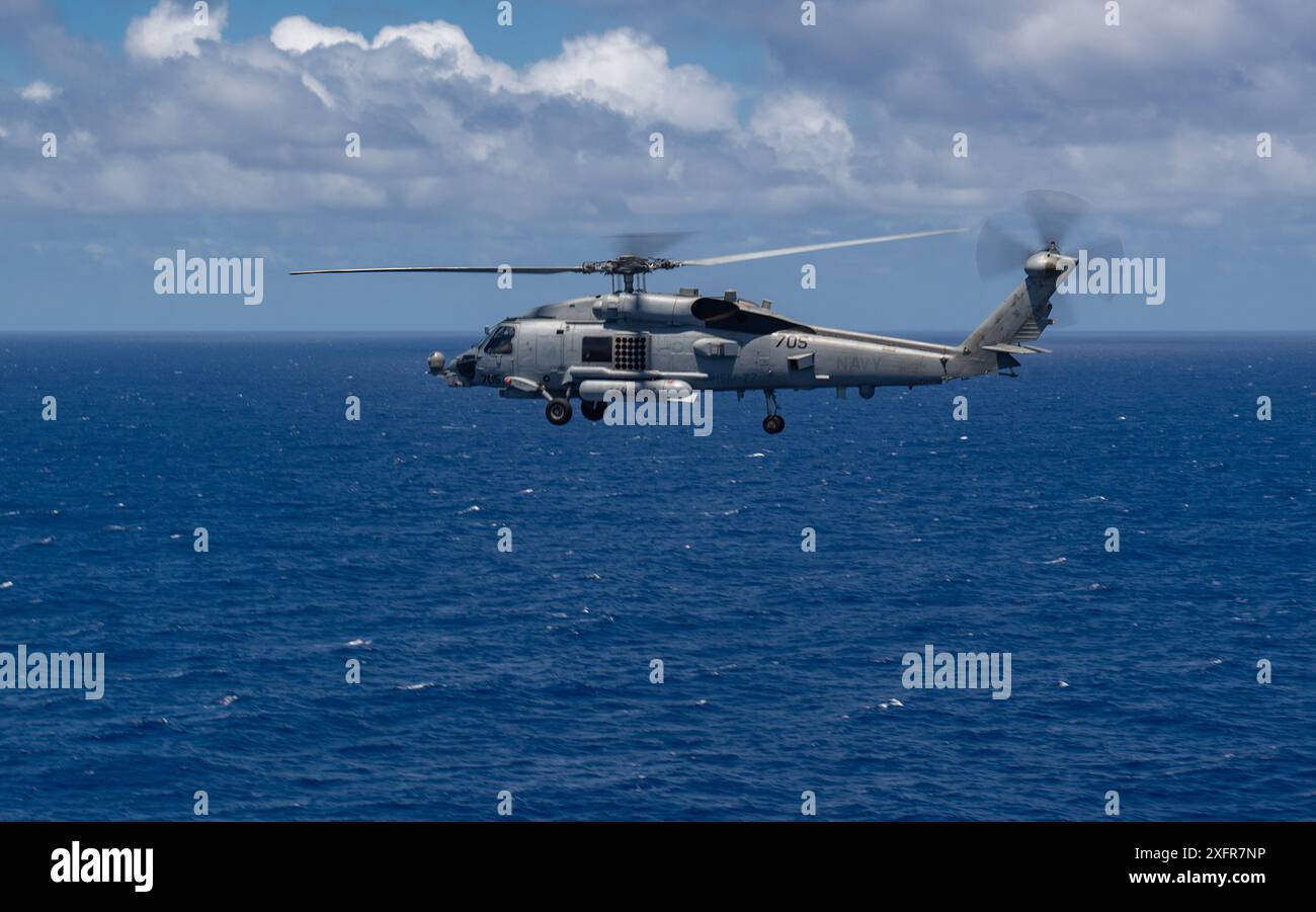 240703-N-AR554-1387 PACIFIC OCEAN (July 3, 2024) An MH-60R Sea Hawk ...
