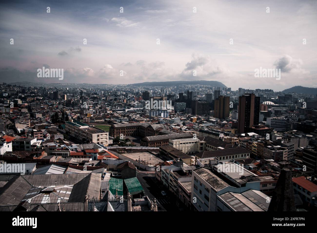 Expansive view of Quito's modern skyline with tall buildings and ...
