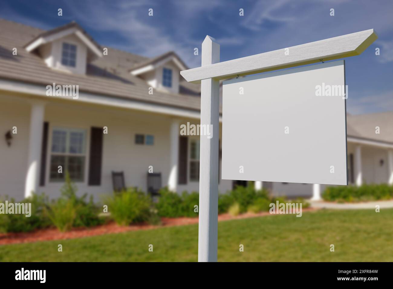 Blank Real Estate Sign in Front of Beautiful House Stock Photo - Alamy