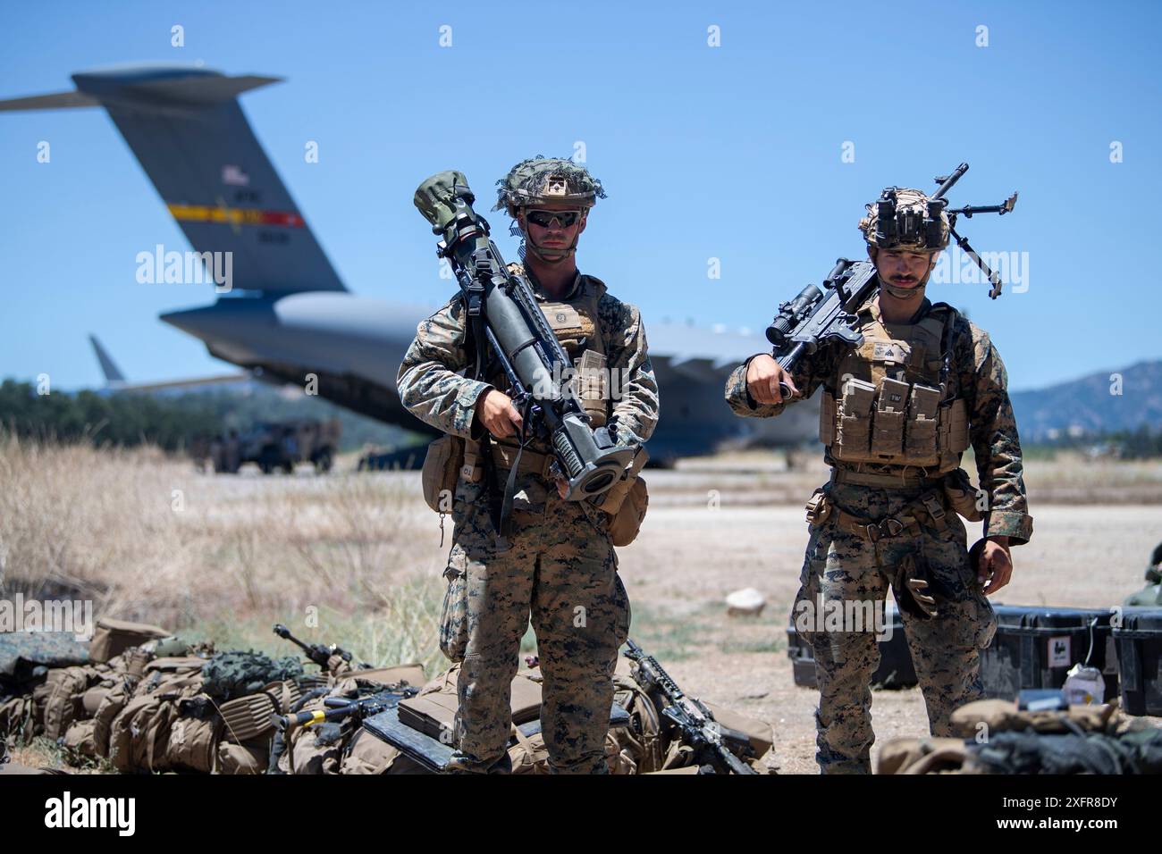 U.S. Marine Corps Cpl. Anthony Salim, left, V17 Suicide Charley Company ...