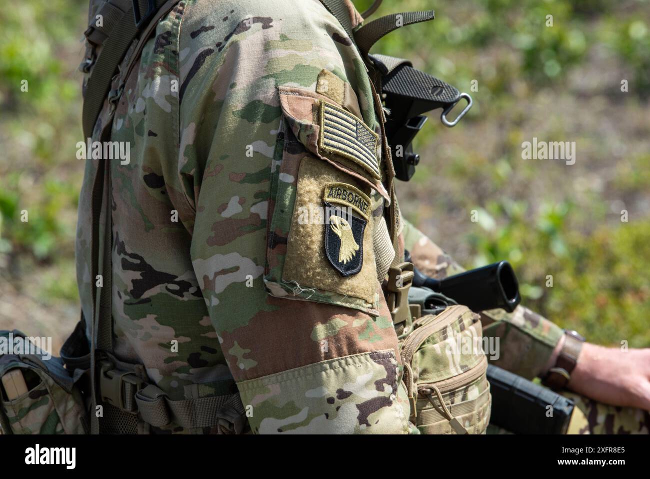 A U.S. Army Soldier from the 11th Airborne Division sits by his company ...