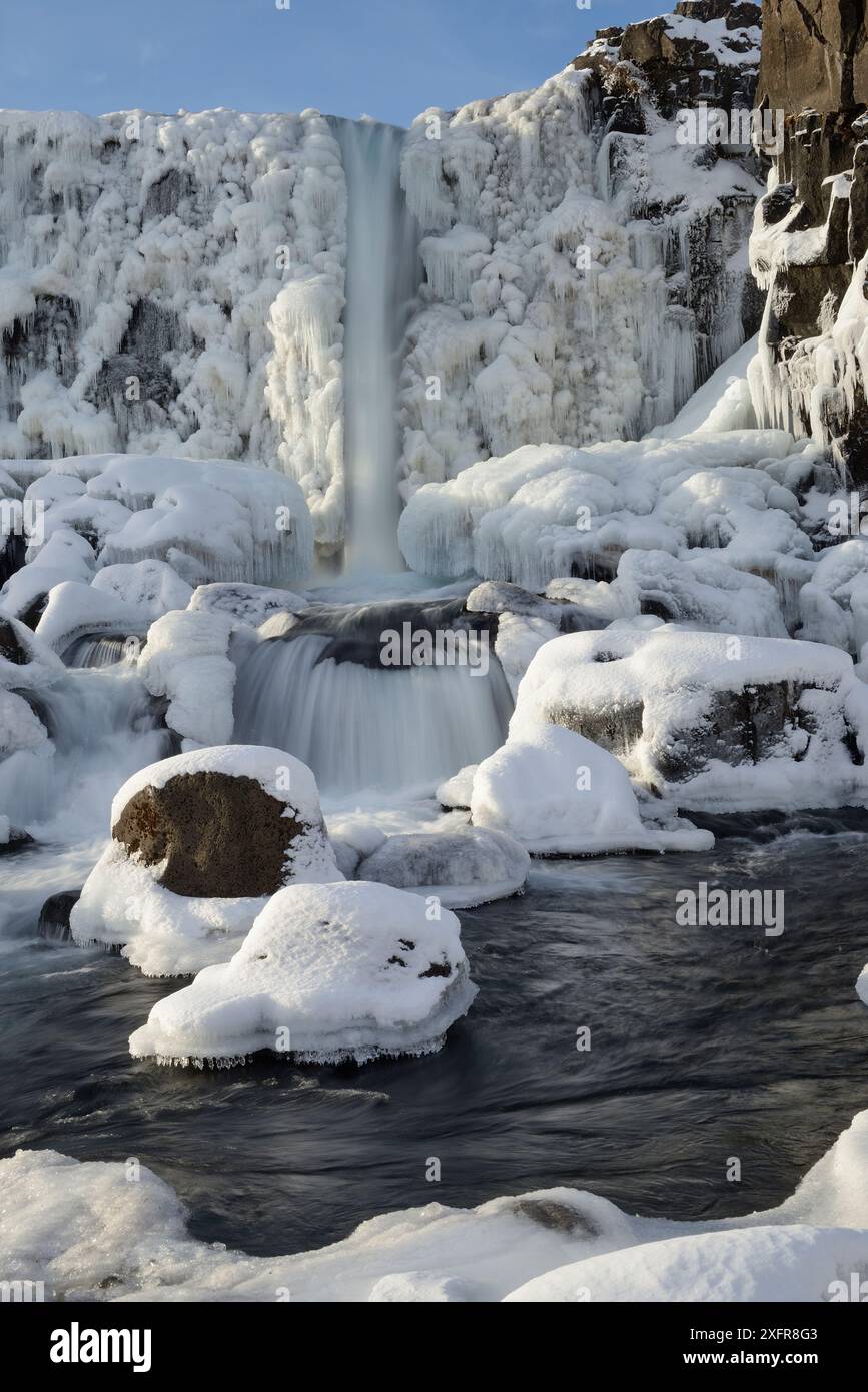 Oxararfoss waterfall in winter, Almannagja Fissure, Thingvellir ...