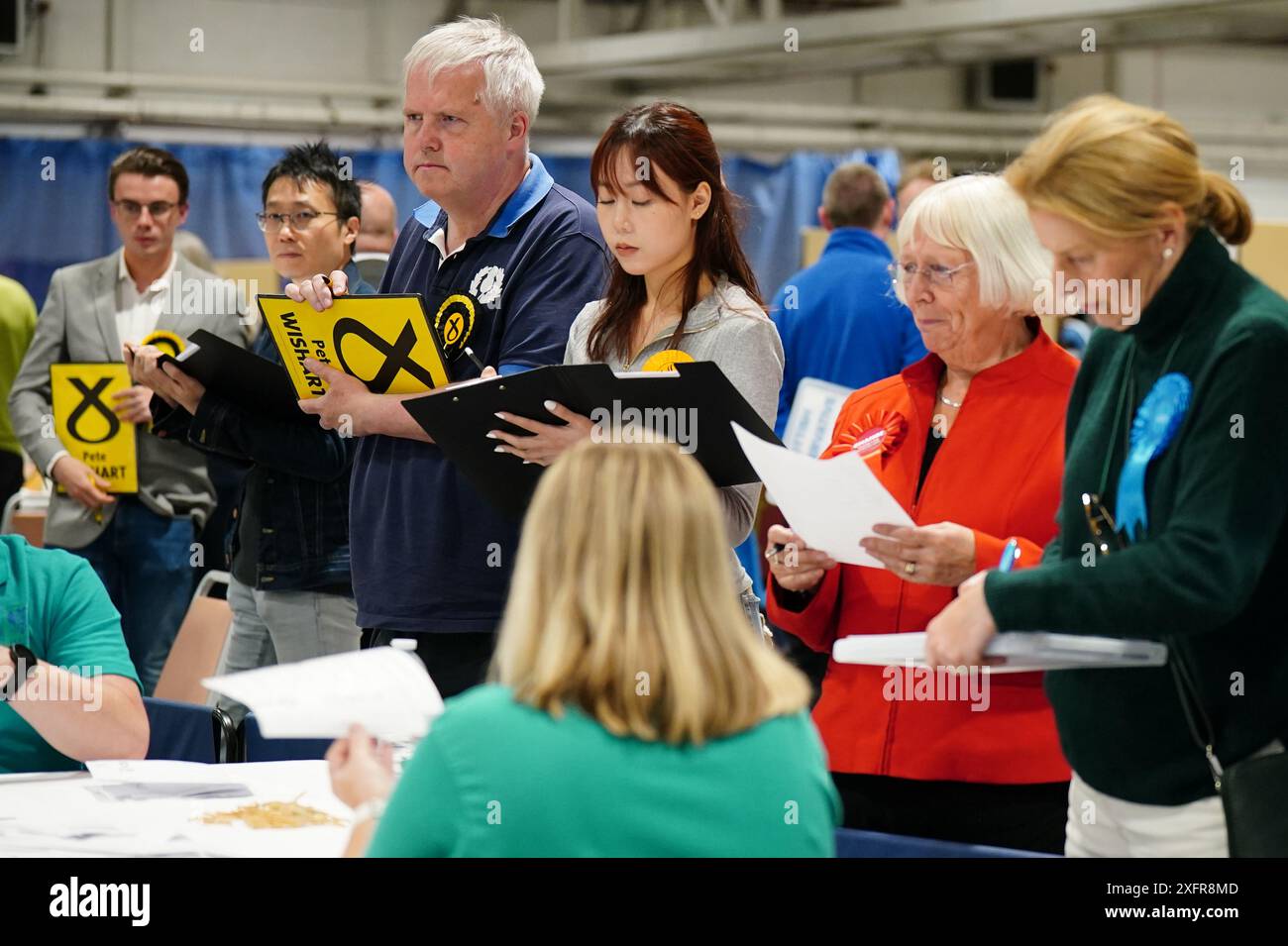 Count verifiers watch as votes are counted at Ice Hall in the Dewars ...