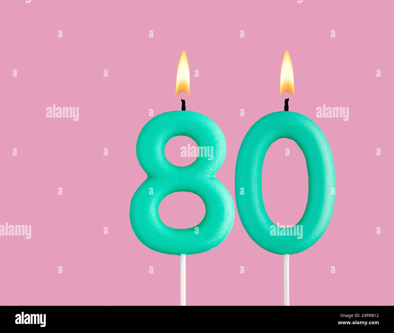 Green candle number 80 - Birthday card on pastel pink background Stock ...