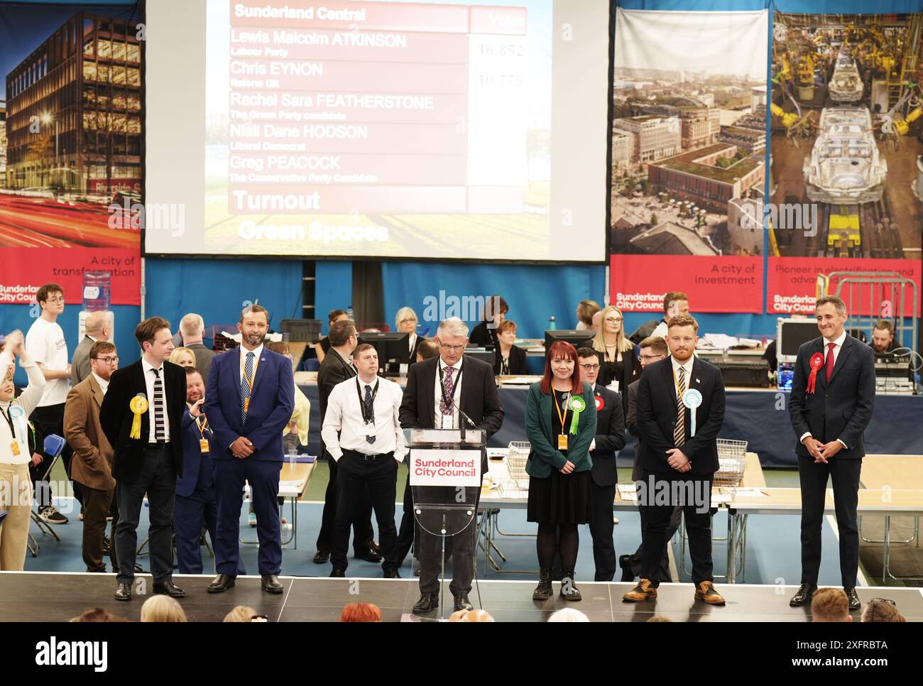 Labour Party's Lewis Atkinson (right) is announced as the winner of the ...