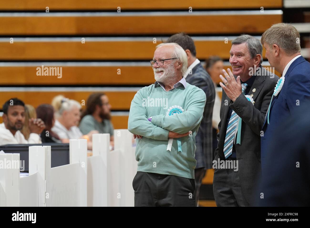 Agents from Reform UK look on as ballots are sorted at Clacton Leisure ...