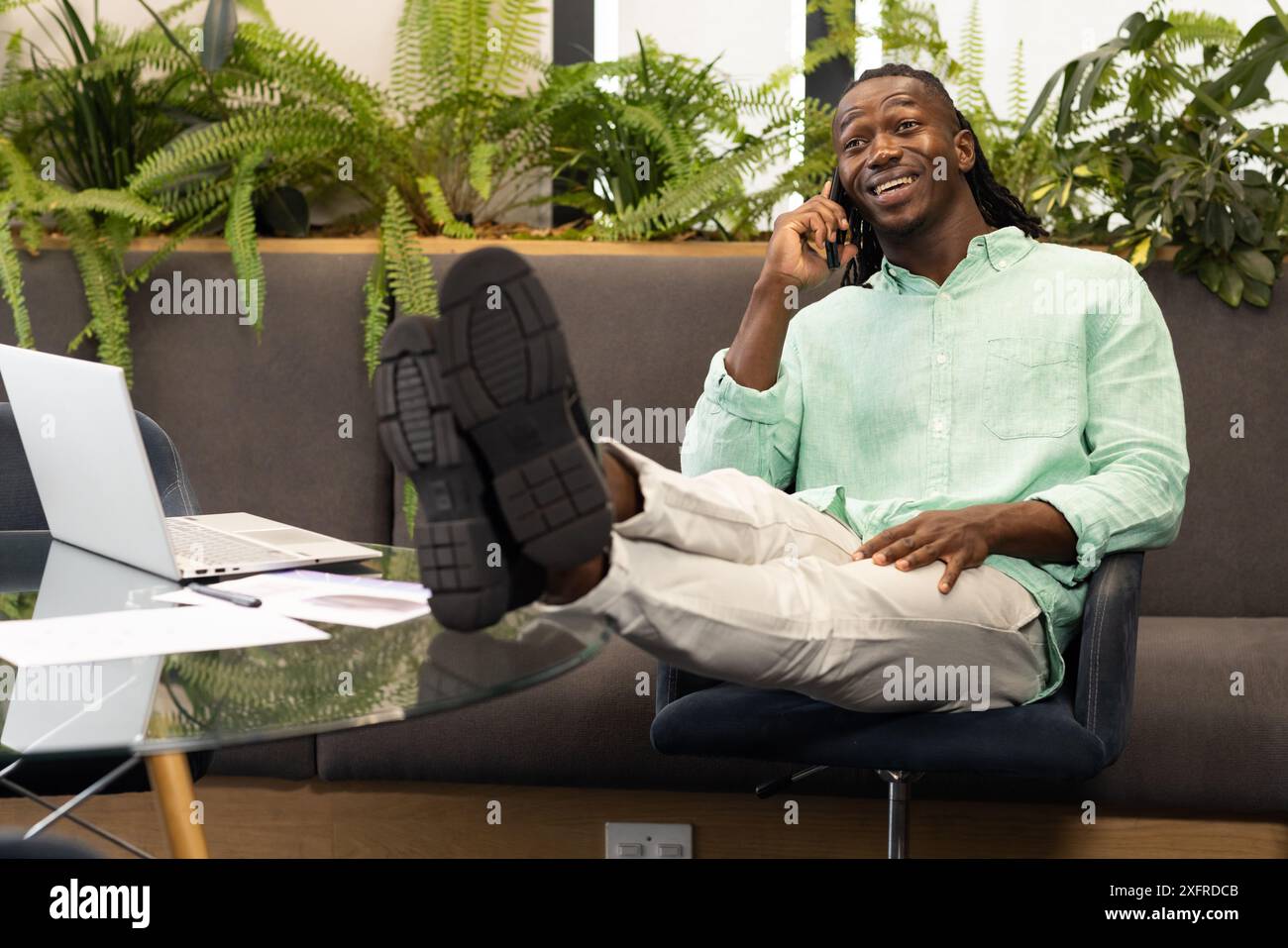 Modern smartphone resting on glass hi-res stock photography and images ...