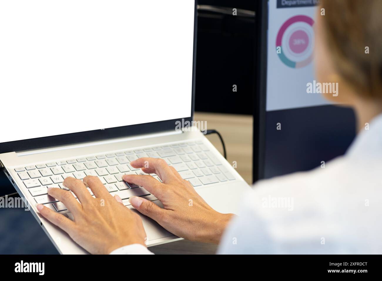 Typing on laptop, person working on project with data chart on screen ...