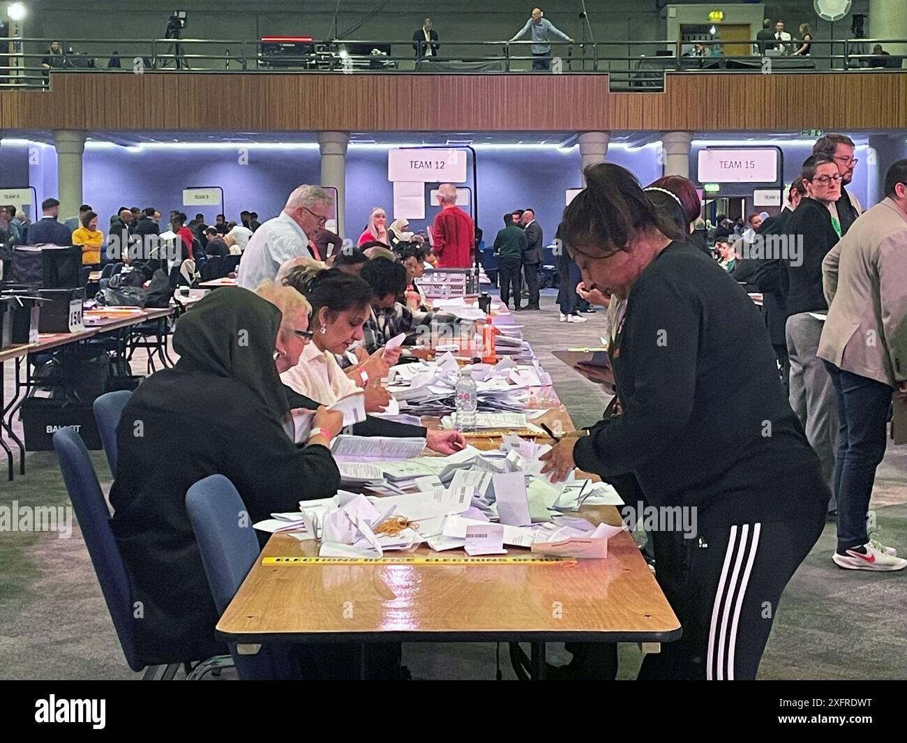 Ballot papers are sorted at the International Convention Centre in ...