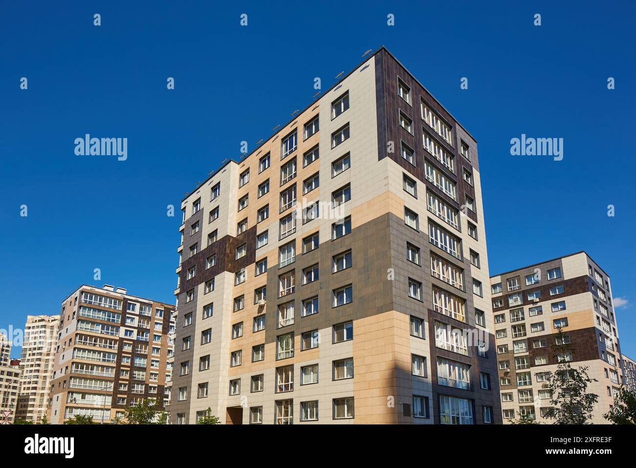 New modern block of flats in green area. residential apartment with ...