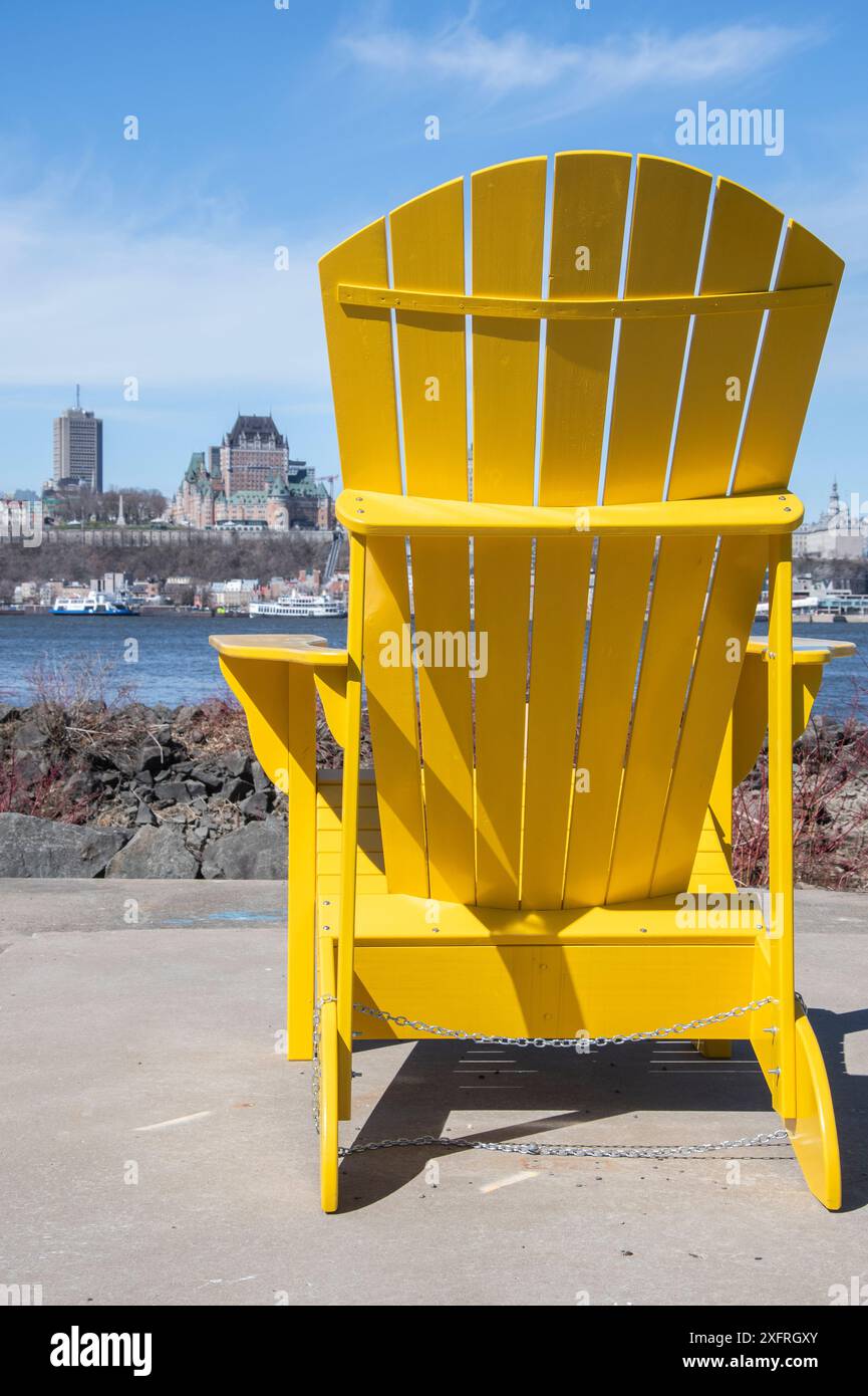 Yellow Adirondack chair with a view of Quebec City at Quai Paquet in ...