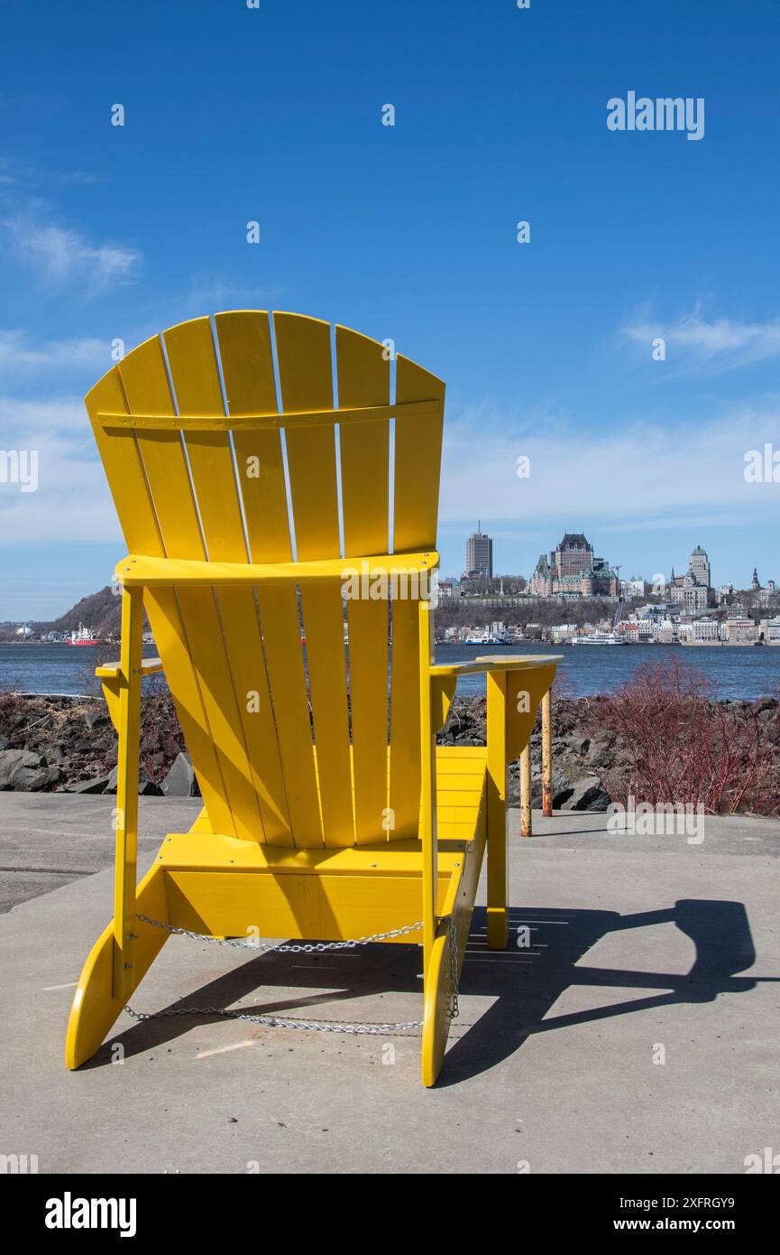 Yellow Adirondack chair with a view of Quebec City at Quai Paquet in ...