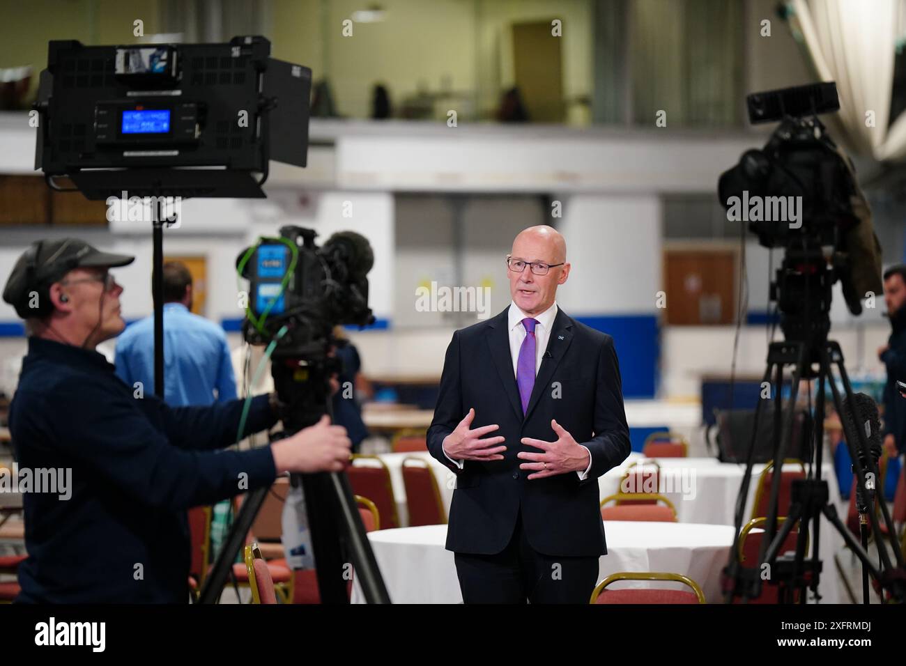 Scottish First Minister and SNP leader John Swinney speaks to the media ...